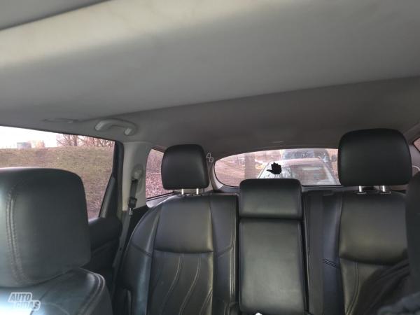 Black Infiniti JX35 2013 in Vilnius, with an engine capacity of 3.50 L and mileage of 225 thousand km for 7900 €, photo 8 on AUTOMOTO.COM.LV