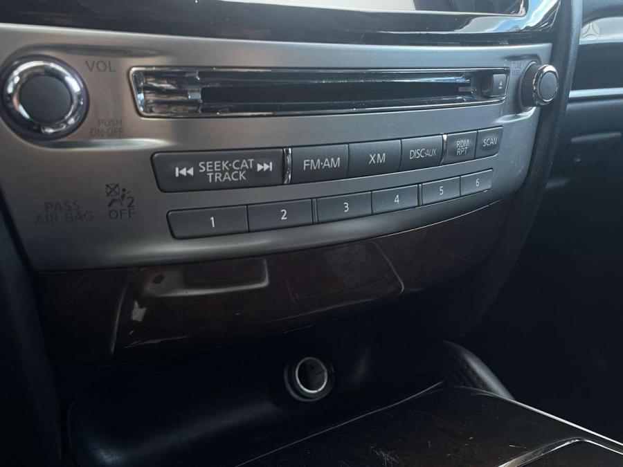 Black Infiniti JX35 2013 in Vilnius, with an engine capacity of 3.50 L and mileage of 279 thousand km for 7499 €, photo 18 on AUTOMOTO.COM.LV