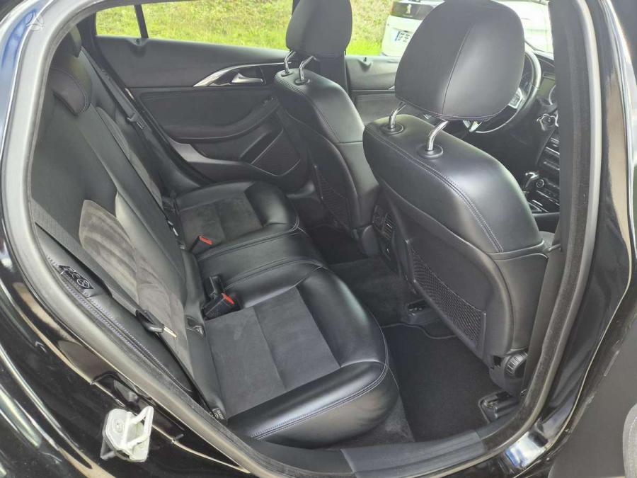 Black Infiniti Q30 2017 in Vilnius, with an engine capacity of 1.46 L and mileage of 285 thousand km for 6800 €, photo 14 on AUTOMOTO.COM.LV