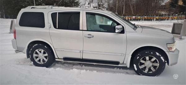 Grey Infiniti QX56 2005 in Vilnius, with an engine capacity of 5.60 L and mileage of 292 thousand km for 4800 €, photo 3 on AUTOMOTO.COM.LV