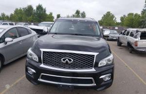 Black Infiniti QX80 2015 in Vilnius, with an engine capacity of 5.55 L and mileage of 293 thousand km for 8500 €, photo 4 on AUTOMOTO.COM.LV