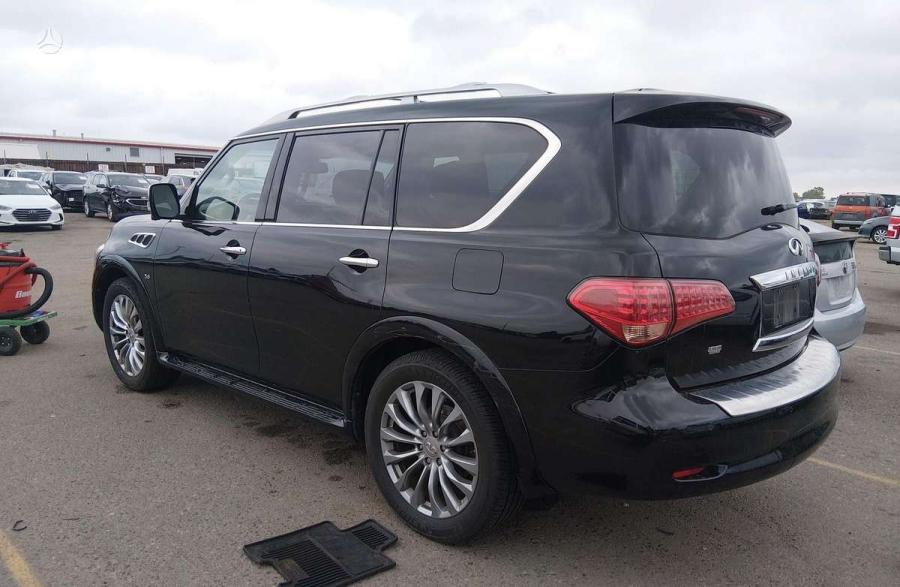Black Infiniti QX80 2015 in Vilnius, with an engine capacity of 5.55 L and mileage of 293 thousand km for 8500 €, photo 7 on AUTOMOTO.COM.LV