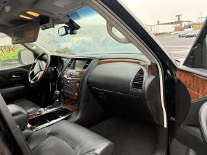 Black Infiniti QX80 2015 in Vilnius, with an engine capacity of 5.55 L and mileage of 293 thousand km for 8500 €, photo 12 on AUTOMOTO.COM.LV