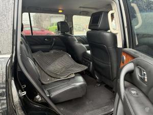 Black Infiniti QX80 2015 in Vilnius, with an engine capacity of 5.55 L and mileage of 293 thousand km for 8500 €, photo 13 on AUTOMOTO.COM.LV