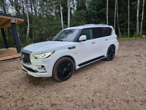 White Infiniti QX80 2019 in Vilnius, with an engine capacity of 5.55 L and mileage of 120 thousand km for 32000 €, photo  on AUTOMOTO.COM.LV