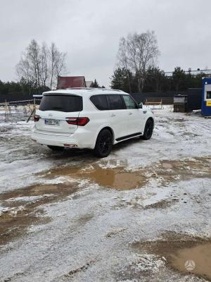 White Infiniti QX80 2019 in Vilnius, with an engine capacity of 5.55 L and mileage of 120 thousand km for 32000 €, photo 3 on AUTOMOTO.COM.LV