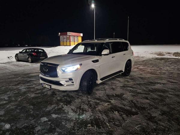 White Infiniti QX80 2019 in Vilnius, with an engine capacity of 5.55 L and mileage of 120 thousand km for 32000 €, photo 5 on AUTOMOTO.COM.LV