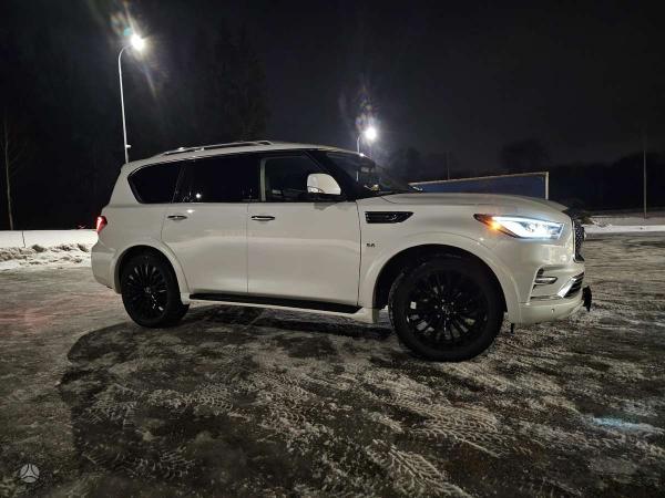 White Infiniti QX80 2019 in Vilnius, with an engine capacity of 5.55 L and mileage of 120 thousand km for 32000 €, photo 8 on AUTOMOTO.COM.LV