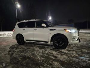 White Infiniti QX80 2019 in Vilnius, with an engine capacity of 5.55 L and mileage of 120 thousand km for 32000 €, photo 8 on AUTOMOTO.COM.LV