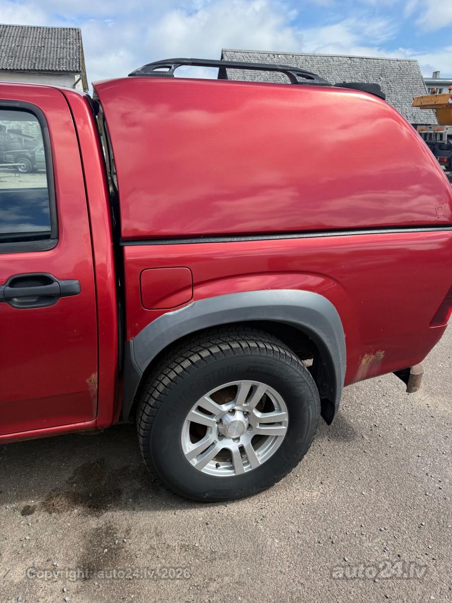 Sarkans Isuzu D-Max 2007 Kerdla, ar dzinēja tilpumu 2.50 L un nobraukumu 381 tūkst. km par 4200 €, foto 6 vietnē AUTOMOTO.COM.LV