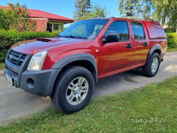 Red Isuzu D-Max 2007 in Otepaa, with an engine capacity of 2.50 L and mileage of 383 thousand km for 5299 €, photo 1 on AUTOMOTO.COM.LV