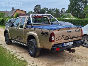 Brown Isuzu pick-up 2008 in Riga, with an engine capacity of 2.50 L and mileage of 284 thousand km for 6500 €, photo 4 on AUTOMOTO.COM.LV