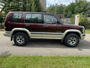 Red Isuzu Trooper 2001 in Riga, with an engine capacity of 3.00 L and mileage of 0 thousand km for 4950 €, photo 8 on AUTOMOTO.COM.LV
