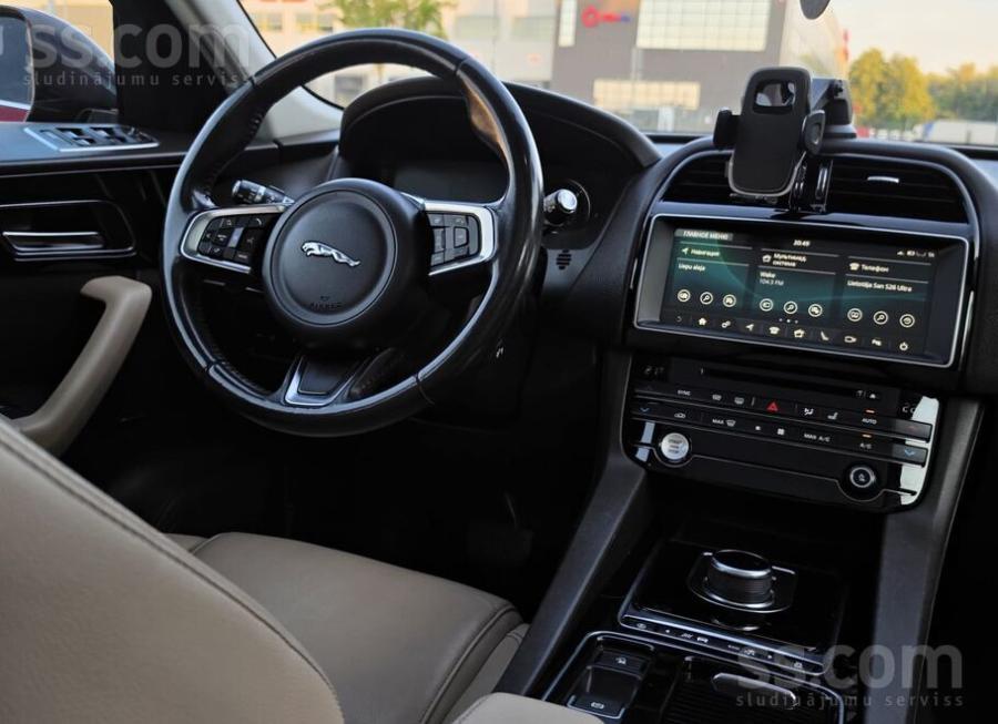 Red Jaguar F-Pace 2018 in Riga, with an engine capacity of 2.00 L and mileage of 130 thousand km for 15800 €, photo 13 on AUTOMOTO.COM.LV
