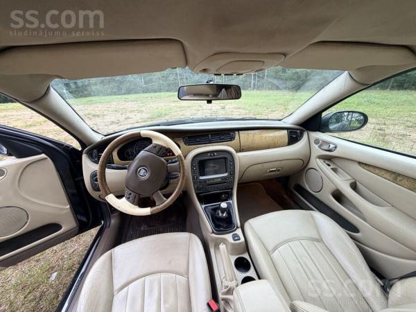 Melns Jaguar X-Type 2005 Daugavpils, ar dzinēja tilpumu 2.00 L un nobraukumu 370 tūkst. km par 1295 €, foto 5 vietnē AUTOMOTO.COM.LV
