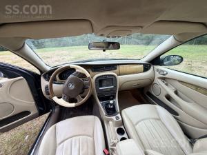 Black Jaguar X-Type 2005 in Daugavpils, with an engine capacity of 2.00 L and mileage of 370 thousand km for 1295 €, photo 5 on AUTOMOTO.COM.LV