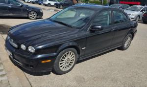 Melns Jaguar X-Type 2009 Kauņa, ar dzinēja tilpumu 2.20 L un nobraukumu 220 tūkst. km par 2499 €, foto  vietnē AUTOMOTO.COM.LV