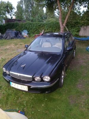 Melns Jaguar X-Type 2006 Kauņa, ar dzinēja tilpumu 2.00 L un nobraukumu 232 tūkst. km par 1300 €, foto  vietnē AUTOMOTO.COM.LV