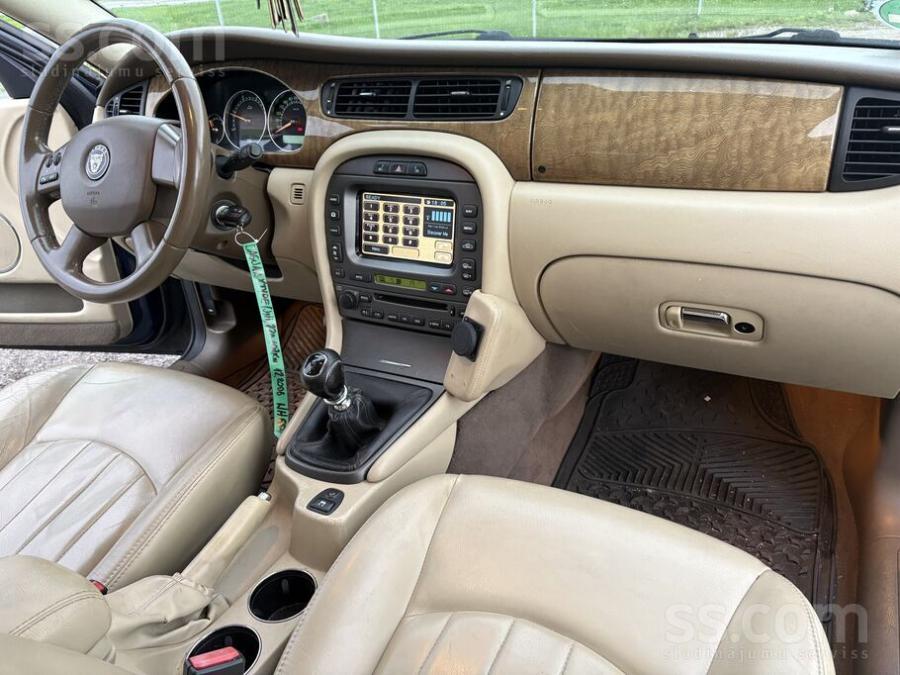 Melns Jaguar X-Type 2006 Daugavpils, ar dzinēja tilpumu 2.20 L un nobraukumu 339 tūkst. km par 1850 €, foto 24 vietnē AUTOMOTO.COM.LV