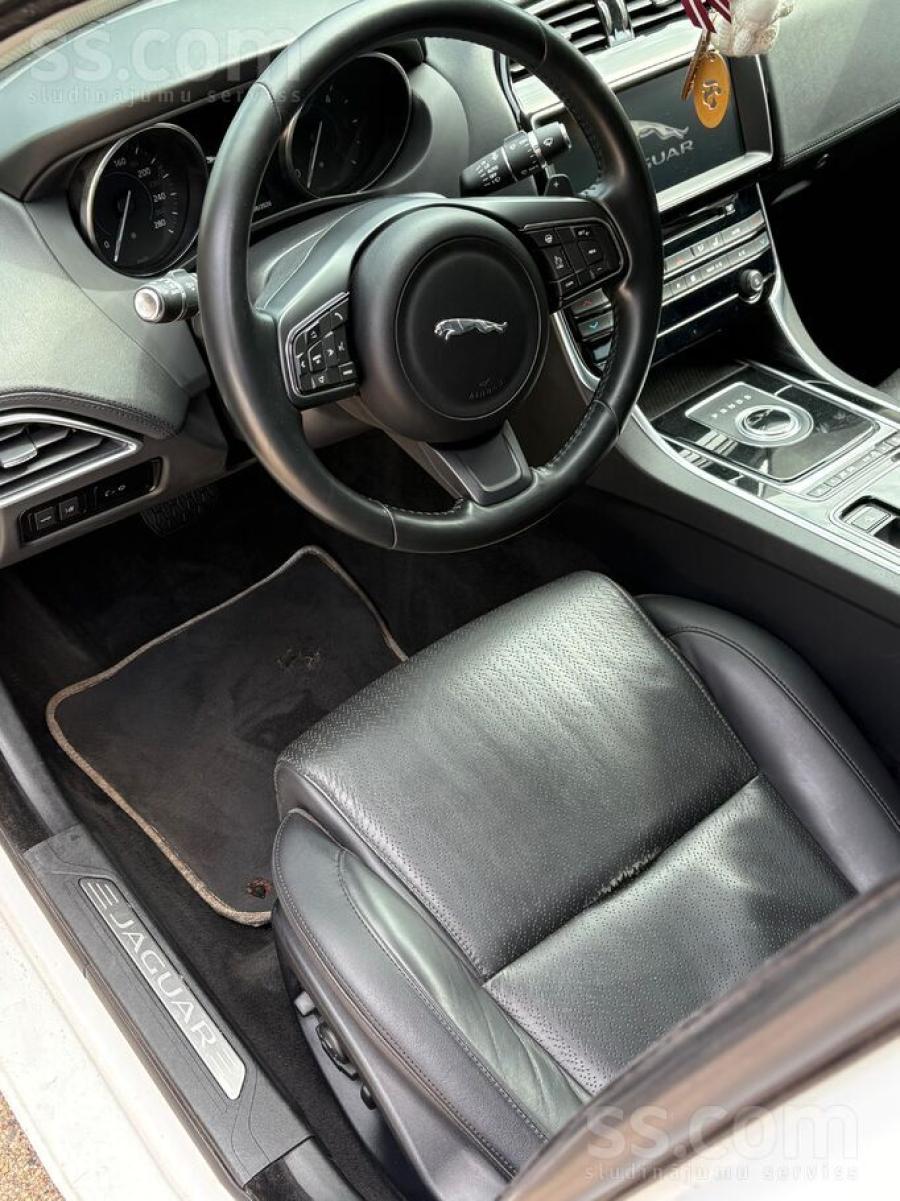 White Jaguar XE 2017 in Riga, with an engine capacity of 2.00 L and mileage of 227 thousand km for 6890 €, photo 16 on AUTOMOTO.COM.LV