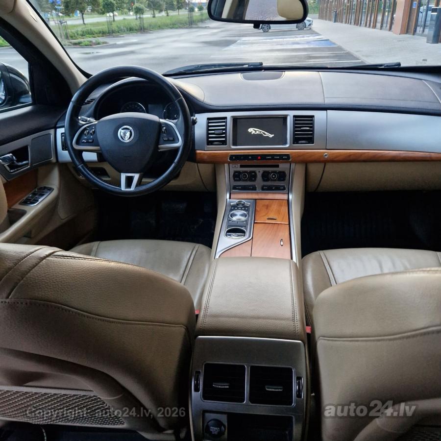 Black Jaguar XF 2012 in Tartu, with an engine capacity of 2.20 L and mileage of 294 thousand km for 3990 €, photo 4 on AUTOMOTO.COM.LV