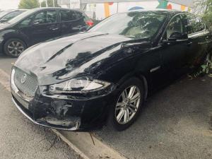 Black Jaguar XF 2013 in Siauliai, with an engine capacity of 2.18 L and mileage of 233 thousand km for 3350 €, photo 2 on AUTOMOTO.COM.LV