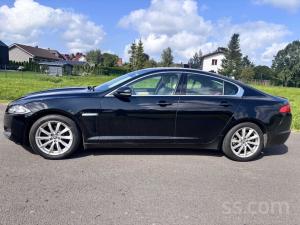 Black Jaguar XF 2013 in Riga, with an engine capacity of 2.20 L and mileage of 101 thousand km for 12500 €, photo 5 on AUTOMOTO.COM.LV