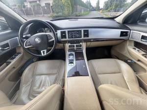 Black Jaguar XF 2013 in Riga, with an engine capacity of 2.20 L and mileage of 101 thousand km for 12500 €, photo 8 on AUTOMOTO.COM.LV