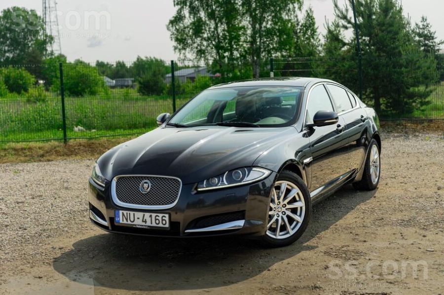 Black Jaguar XF 2013 in Riga, with an engine capacity of 2.20 L and mileage of 279 thousand km for 8990 €, photo 1 on AUTOMOTO.COM.LV