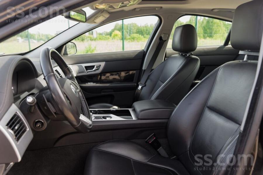 Black Jaguar XF 2013 in Riga, with an engine capacity of 2.20 L and mileage of 279 thousand km for 8990 €, photo 9 on AUTOMOTO.COM.LV