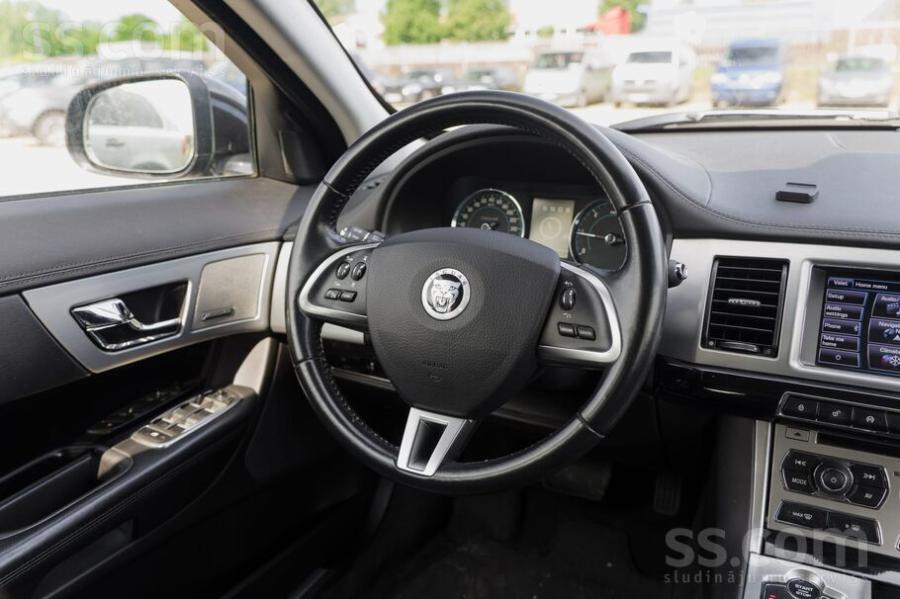 Black Jaguar XF 2013 in Riga, with an engine capacity of 2.20 L and mileage of 279 thousand km for 8990 €, photo 14 on AUTOMOTO.COM.LV