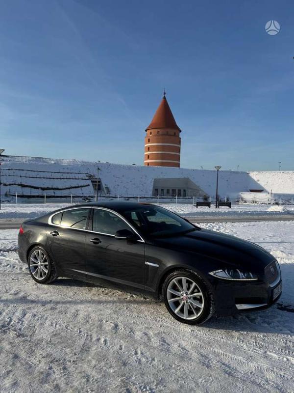 Black Jaguar XF 2015 in Klaipeda, with an engine capacity of 2.18 L and mileage of 128 thousand km for 10800 €, photo 1 on AUTOMOTO.COM.LV
