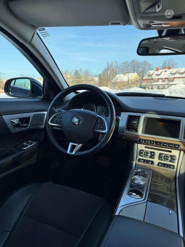Black Jaguar XF 2015 in Klaipeda, with an engine capacity of 2.18 L and mileage of 128 thousand km for 10800 €, photo 6 on AUTOMOTO.COM.LV