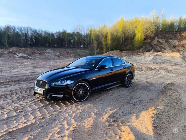 Black Jaguar XF 2015 in Vilnius, with an engine capacity of 2.18 L and mileage of 232 thousand km for 7450 €, photo 1 on AUTOMOTO.COM.LV