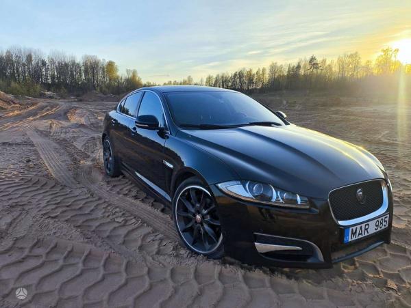Black Jaguar XF 2015 in Vilnius, with an engine capacity of 2.18 L and mileage of 232 thousand km for 7450 €, photo 6 on AUTOMOTO.COM.LV