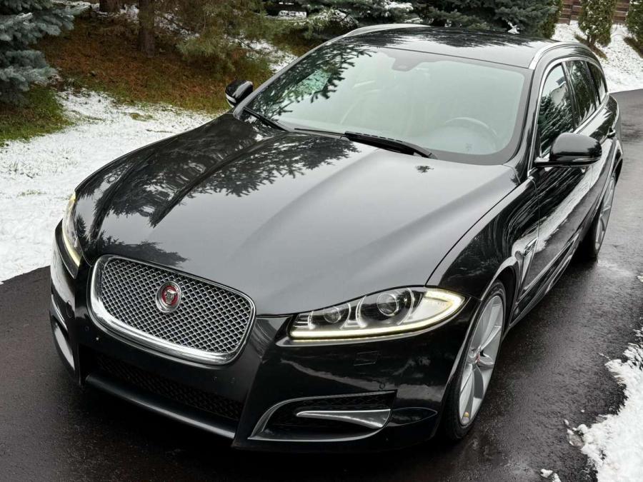 Black Jaguar XF 2015 in Utena, with an engine capacity of 2.18 L and mileage of 212 thousand km for 6950 €, photo 6 on AUTOMOTO.COM.LV