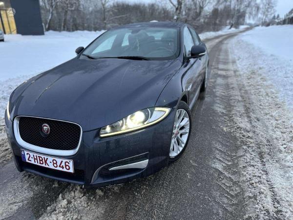 Blue Jaguar XF 2015 in Utena, with an engine capacity of 2.18 L and mileage of 228 thousand km for 6550 €, photo 1 on AUTOMOTO.COM.LV