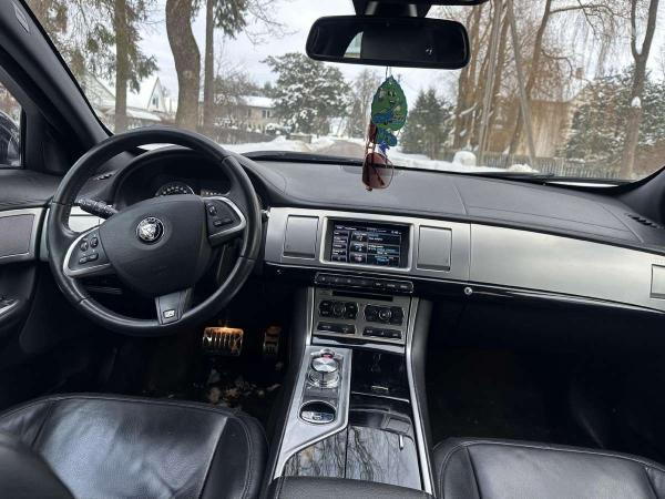 Blue Jaguar XF 2015 in Utena, with an engine capacity of 2.18 L and mileage of 233 thousand km for 6550 €, photo 7 on AUTOMOTO.COM.LV