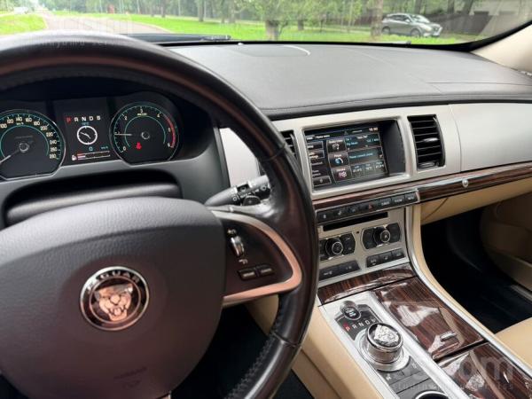 Red Jaguar XF 2015 in Riga, with an engine capacity of 2.20 L and mileage of 294 thousand km for 7600 €, photo 7 on AUTOMOTO.COM.LV