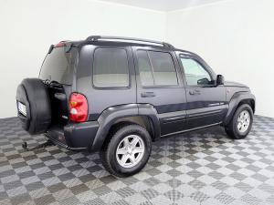 Melns Jeep Cherokee 2004 Tallina, ar dzinēja tilpumu 2.80 L un nobraukumu 208 tūkst. km par 2999 €, foto 12 vietnē AUTOMOTO.COM.LV