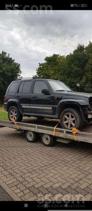 Black Jeep Cherokee 2005 in Riga, with an engine capacity of 3.70 L and mileage of 200 thousand km for 1500 €, photo 6 on AUTOMOTO.COM.LV