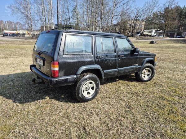 Blue Jeep Cherokee 1997 in Ogre, with an engine capacity of 2.50 L and mileage of 262 thousand km for 3700 €, photo 4 on AUTOMOTO.COM.LV