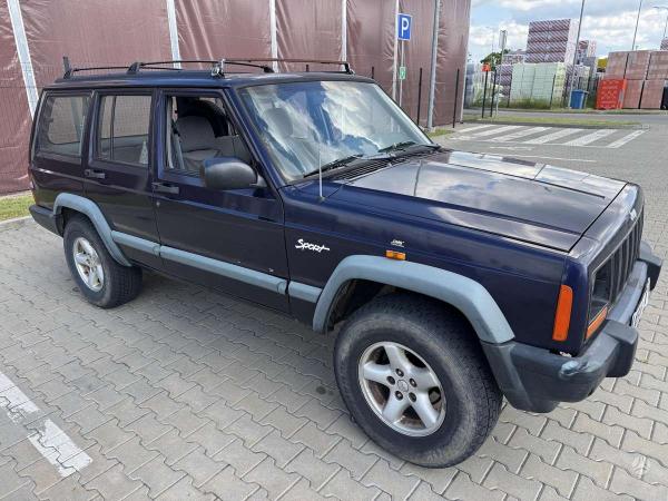 Blue Jeep Cherokee 1998 in Vilnius, with an engine capacity of 2.50 L and mileage of 258 thousand km for 3500 €, photo 4 on AUTOMOTO.COM.LV