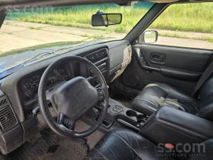 Синий Джип Чероки 1999 в Елгава, объемом двигателя 4.00 л и пробегом 225 тыс. км за 6600 €, фото 7 на AUTOMOTO.COM.LV