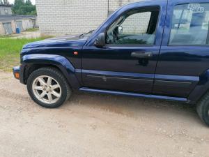 Blue Jeep Cherokee 2006 in Utena, with an engine capacity of 2.80 L and mileage of 146 thousand km for 2850 €, photo 12 on AUTOMOTO.COM.LV