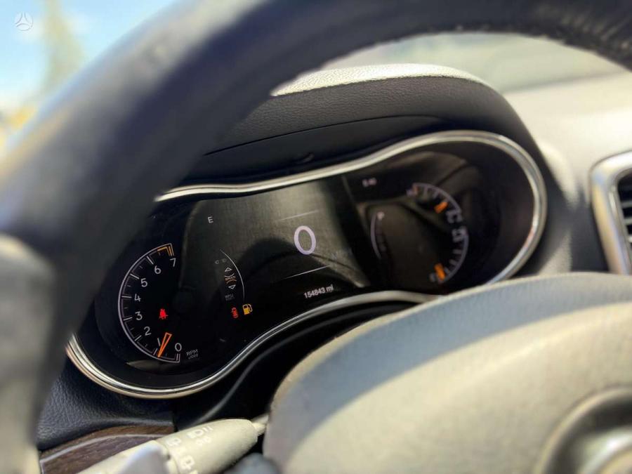 Blue Jeep Cherokee 2015 in Siauliai, with an engine capacity of 3.60 L and mileage of 200 thousand km for 7200 €, photo 14 on AUTOMOTO.COM.LV