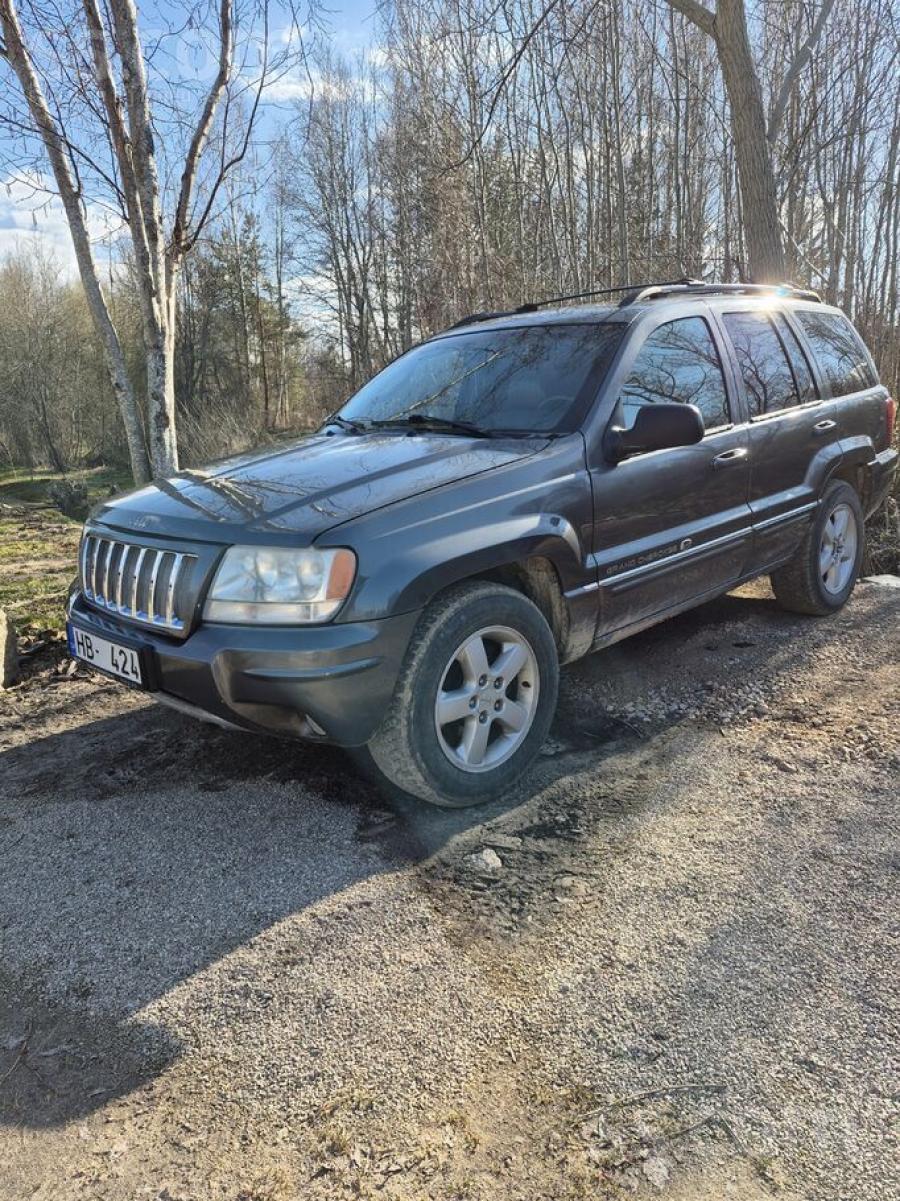 Pelēks Jeep Cherokee 2003 Jelgava, ar dzinēja tilpumu 4.70 L un nobraukumu 317 tūkst. km par 2500 €, foto 1 vietnē AUTOMOTO.COM.LV
