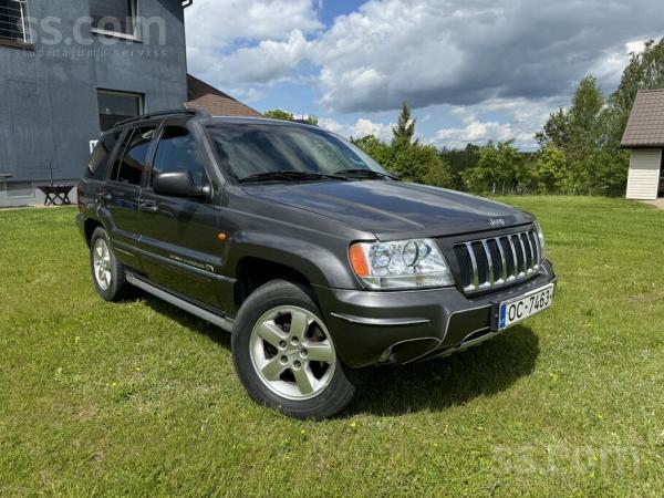 Pelēks Jeep Cherokee 2004 Dobele, ar dzinēja tilpumu 4.70 L un nobraukumu 135 tūkst. km par 14300 €, foto 1 vietnē AUTOMOTO.COM.LV