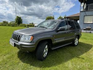 Pelēks Jeep Cherokee 2004 Dobele, ar dzinēja tilpumu 4.70 L un nobraukumu 135 tūkst. km par 14300 €, foto 2 vietnē AUTOMOTO.COM.LV
