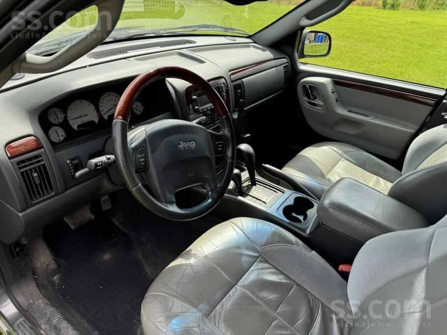 Pelēks Jeep Cherokee 2004 Dobele, ar dzinēja tilpumu 4.70 L un nobraukumu 135 tūkst. km par 14300 €, foto 8 vietnē AUTOMOTO.COM.LV